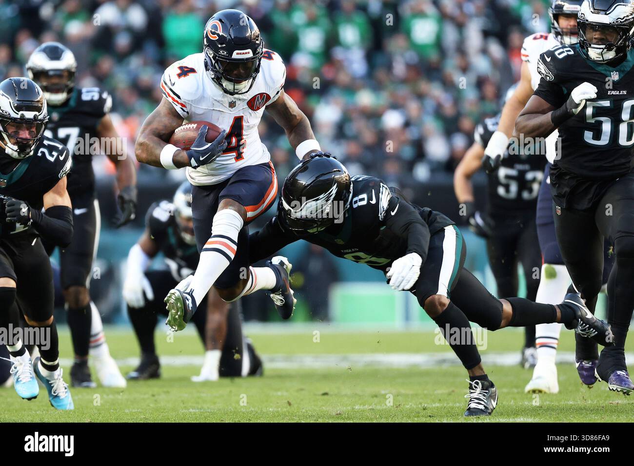 Chicago Bears running back D'Andre Swift (4) stiff arms Philadelphia ...