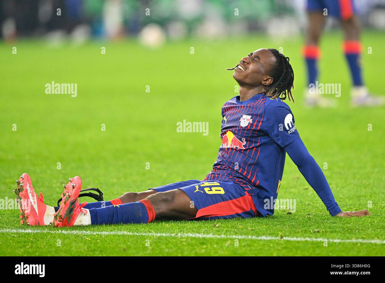 Leipzig's Yan Diomande reacts at the end of the Bundesliga soccer match ...