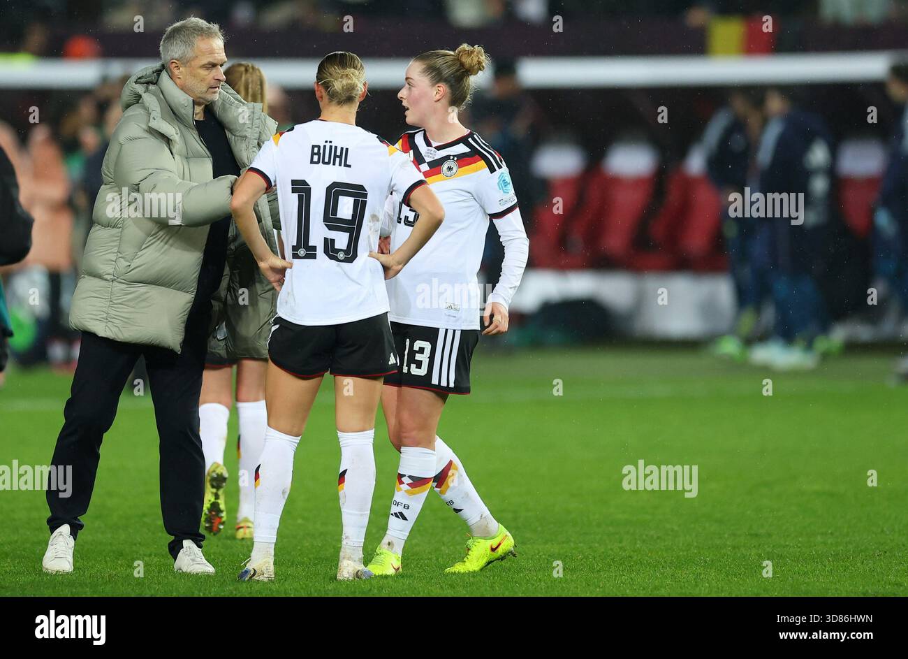 from left: national coach Christian Wueck (Germany), Klara Buehl, Alara ...