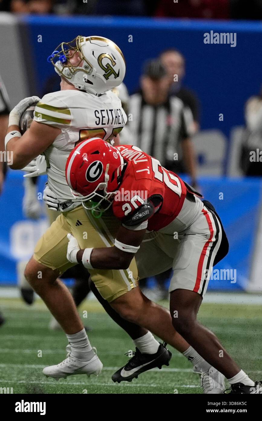Georgia Tech tight end Brett Seither (80) makes the catch against Georgia defensive back Jacorey ...