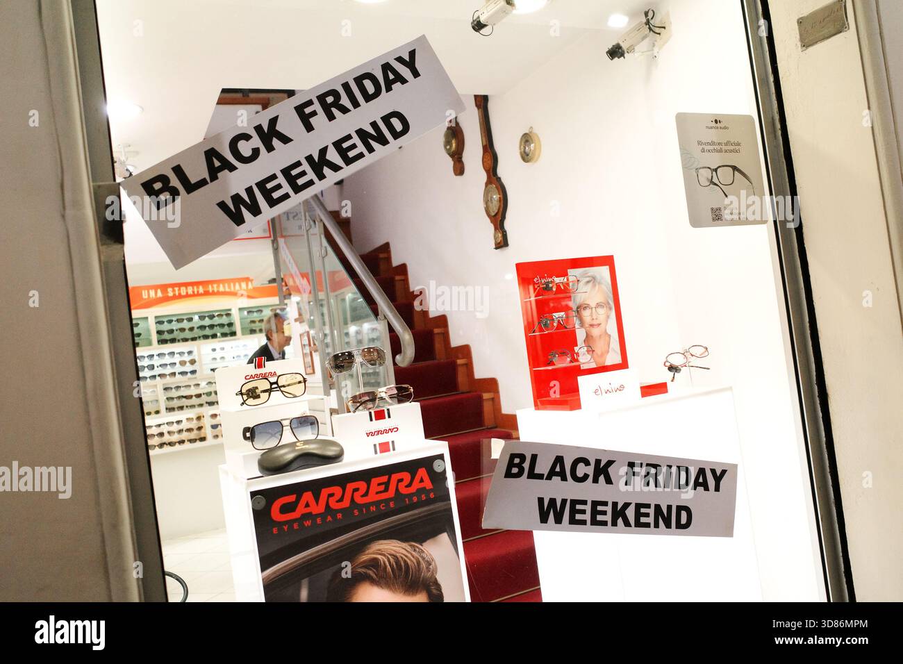 Black Friday signage is displayed at a storefront in Rome, Italy on ...