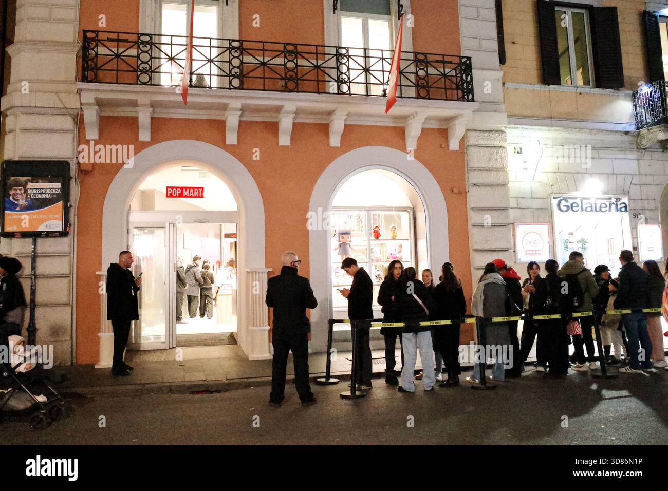 People line up to enter Pop Mart on Black Friday in Rome, Italy on ...