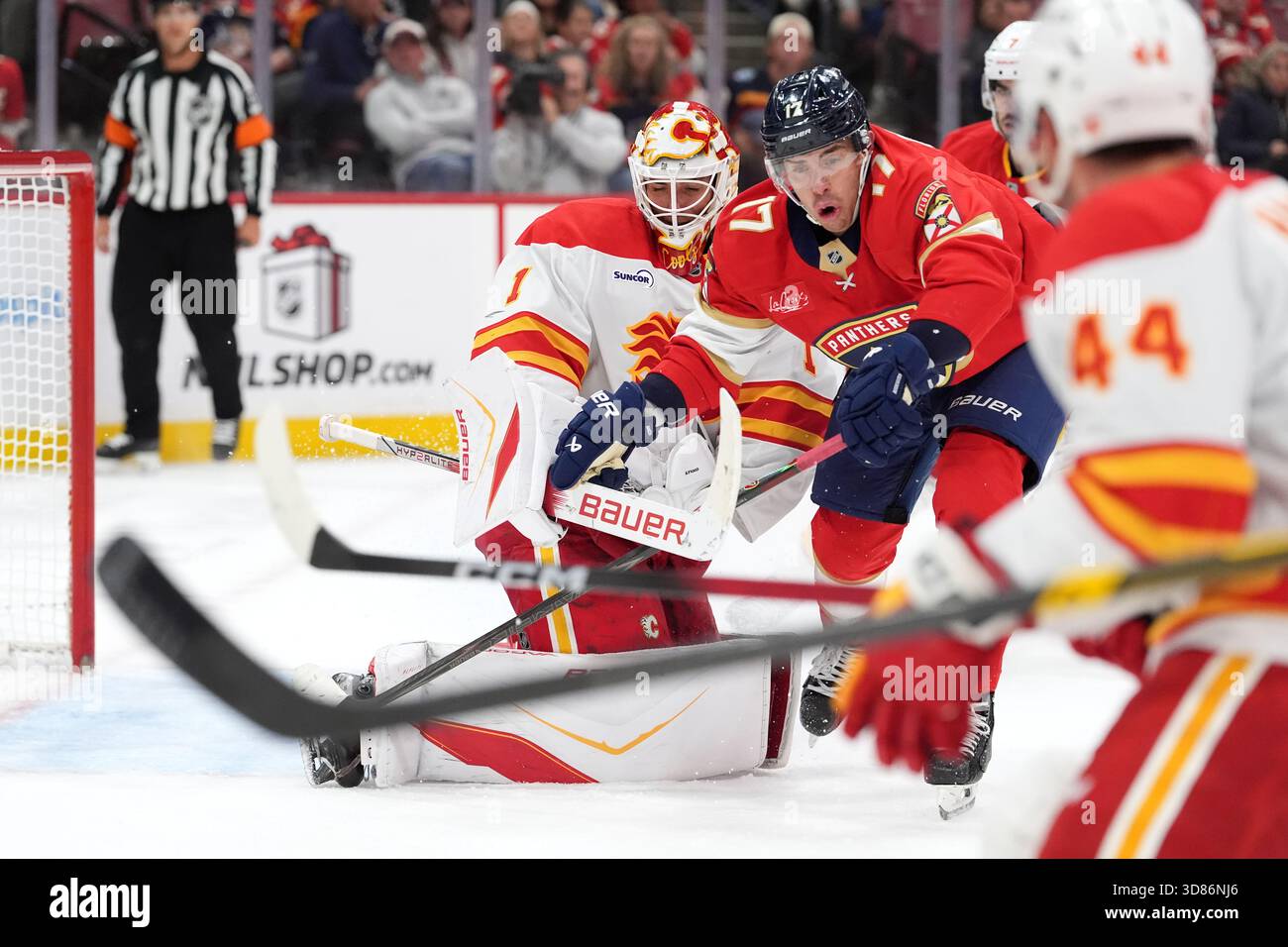 Florida Panthers center Evan Rodrigues (17) vies with Calgary Flames ...