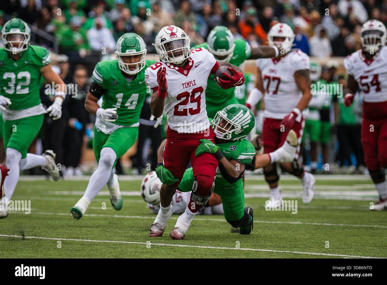Temple running back Hunter Smith (29) is tackled by North Texas safety ...