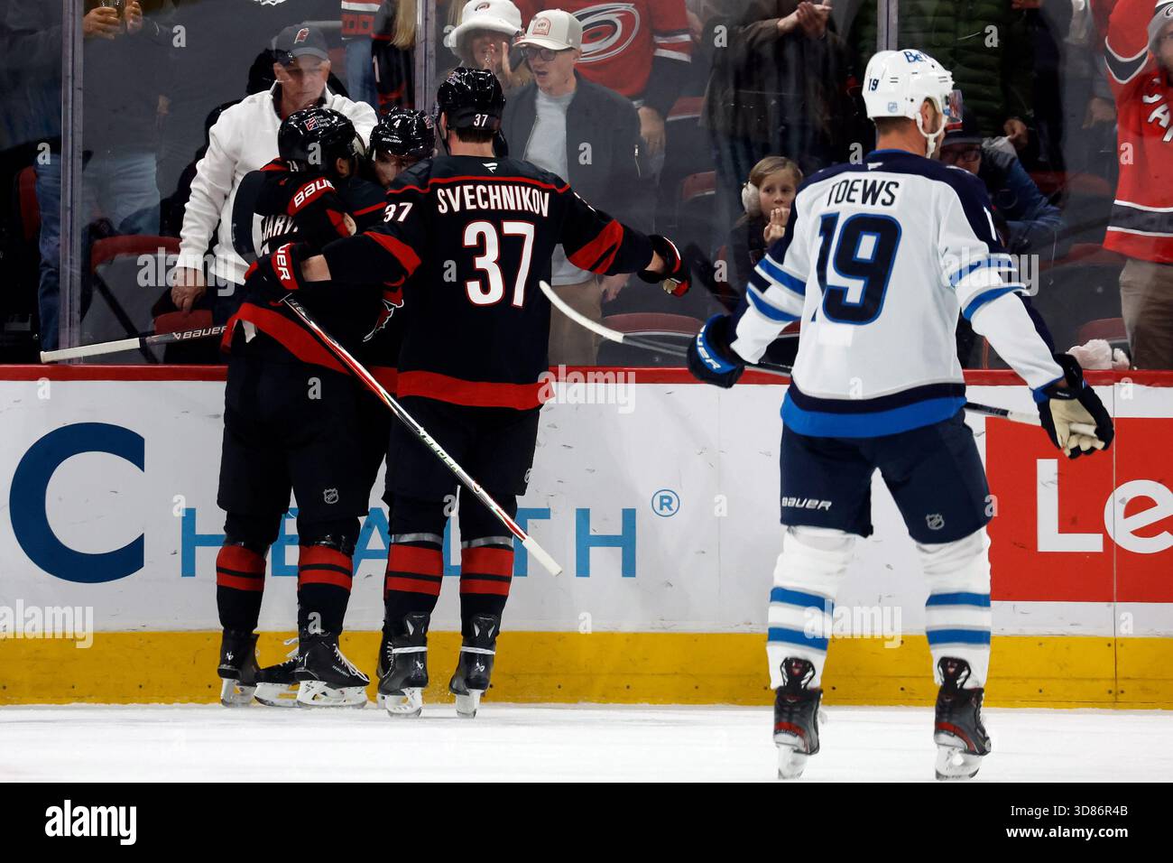 Carolina Hurricanes celebrate a goal by Seth Jarvis as Winnipeg Jets ...