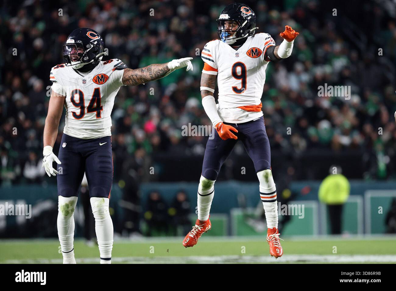Chicago Bears safety Jaquan Brisker (9) and Chicago Bears defensive end ...