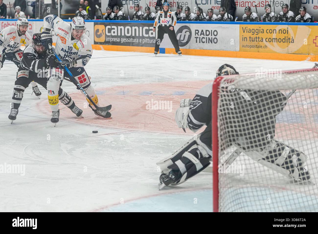 PORZA, SWITZERLAND - NOVEMBER 28: Alex Formenton of Ambri R) against ...