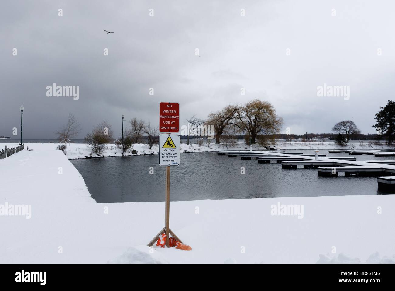 A snow squall descends over Lake Simcoe along the Barrie, Ont ...