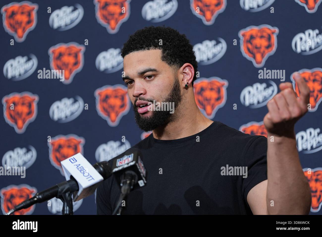 Chicago Bears quarterback Caleb Williams (18) speaks after his team's ...