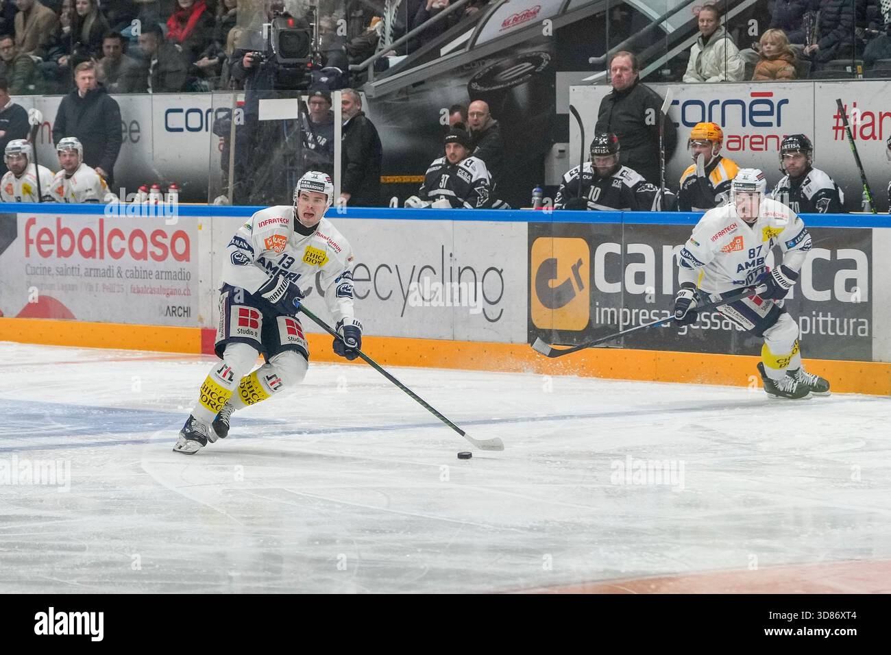 PORZA, SWITZERLAND - NOVEMBER 28: Manix Landry of Ambri L) in action ...