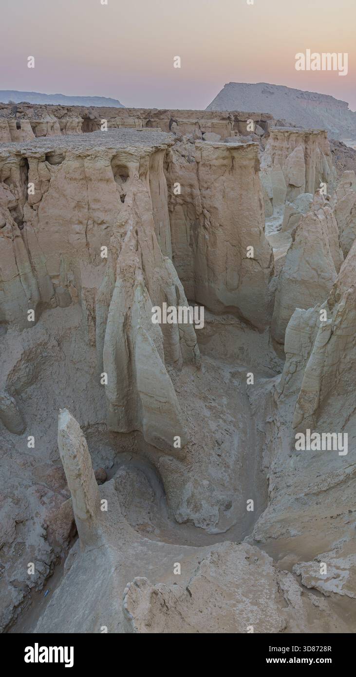 Aerial view of the stark, sun-baked yardangs rise from the desert floor ...