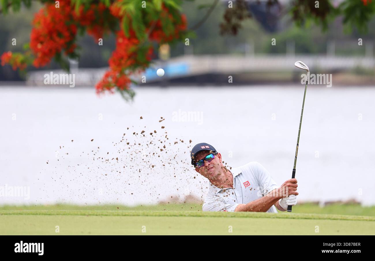 Australia's Adam Scott plays out of a bunker on the 5th during the ...