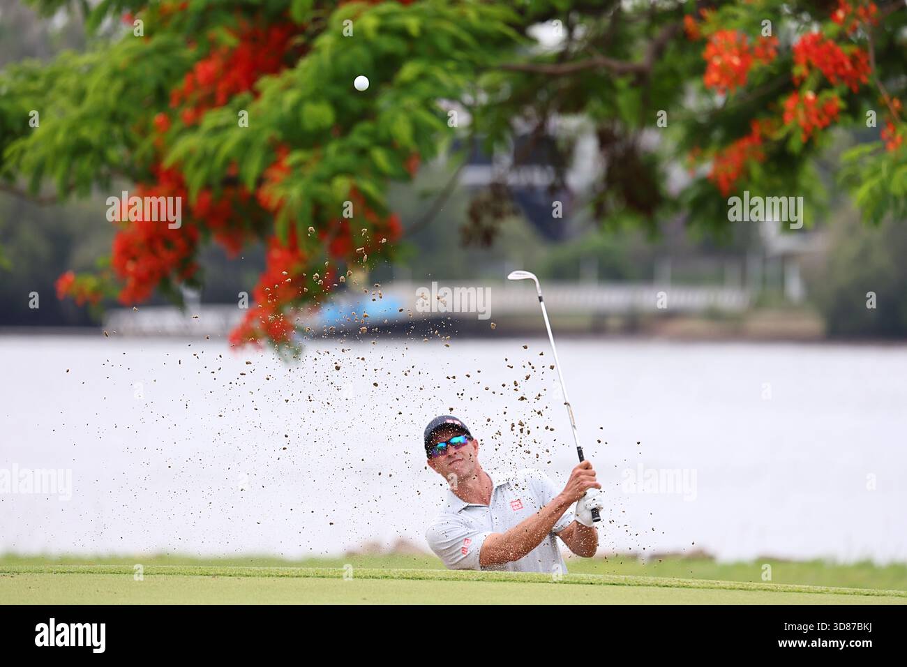 Australia's Adam Scott plays out of a bunker on the 5th during the ...