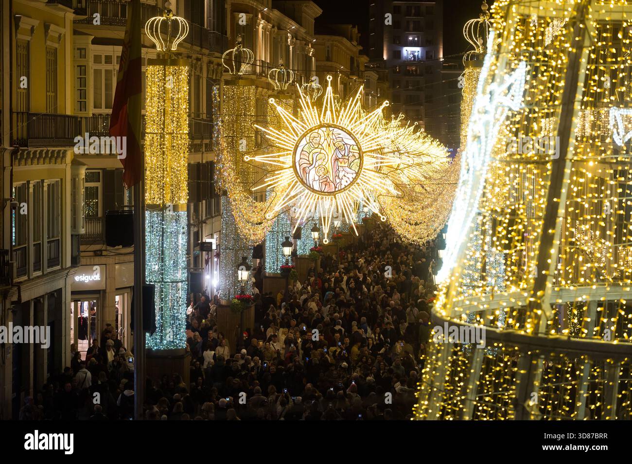 The new Christmas decorations are seen illuminated after the lighting ...