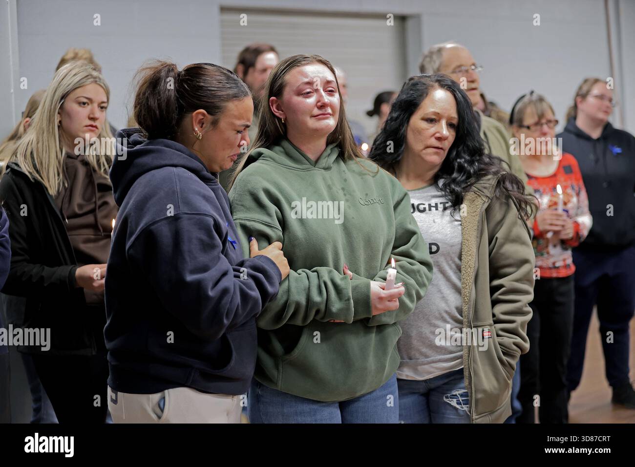 Carly Shorts, Anna Fletcher and Sherry Hise gather for a vigil in honor ...