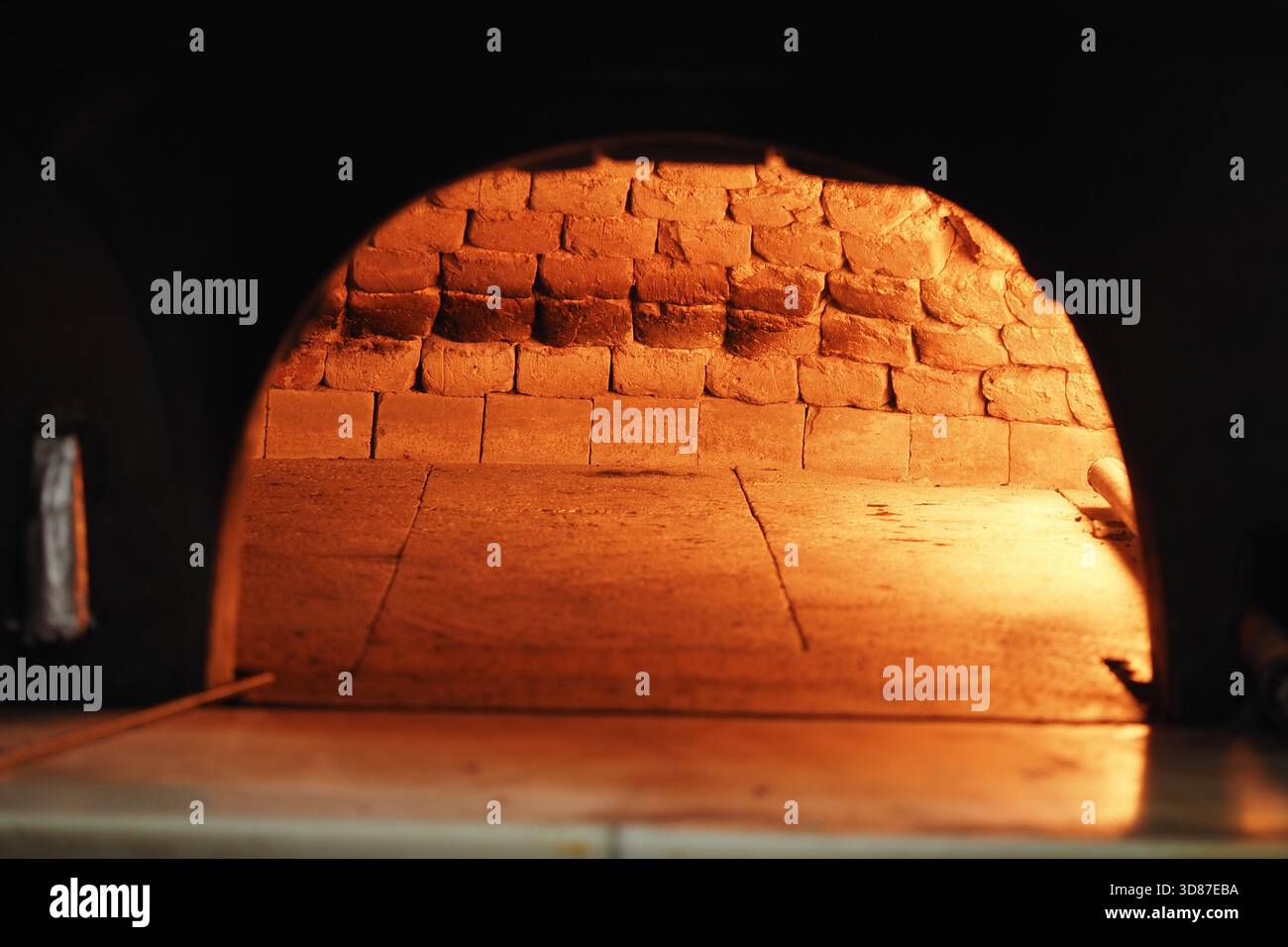 Baking bread wood fired oven hi-res stock photography and images - Alamy