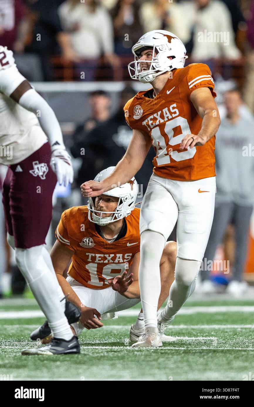 Texas kicker Mason Shipley, right, kicks a field goal against Texas A&M ...