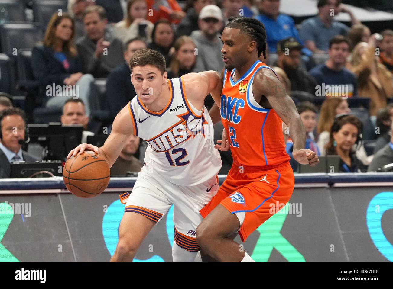 Phoenix Suns guard Collin Gillespie, left, pushes past Oklahoma City ...