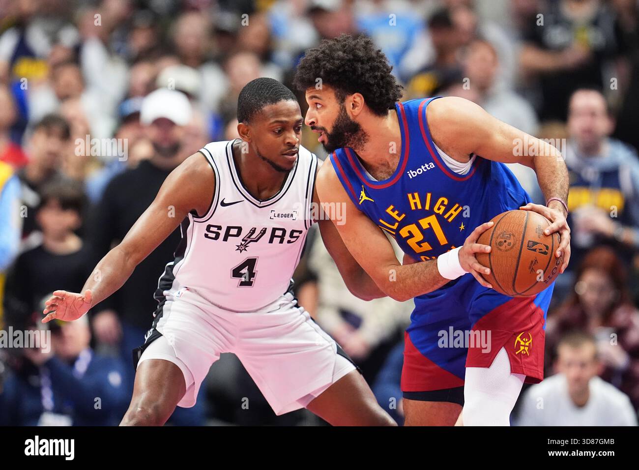 Denver Nuggets guard Jamal Murray, right, looks to pass the ball as San ...
