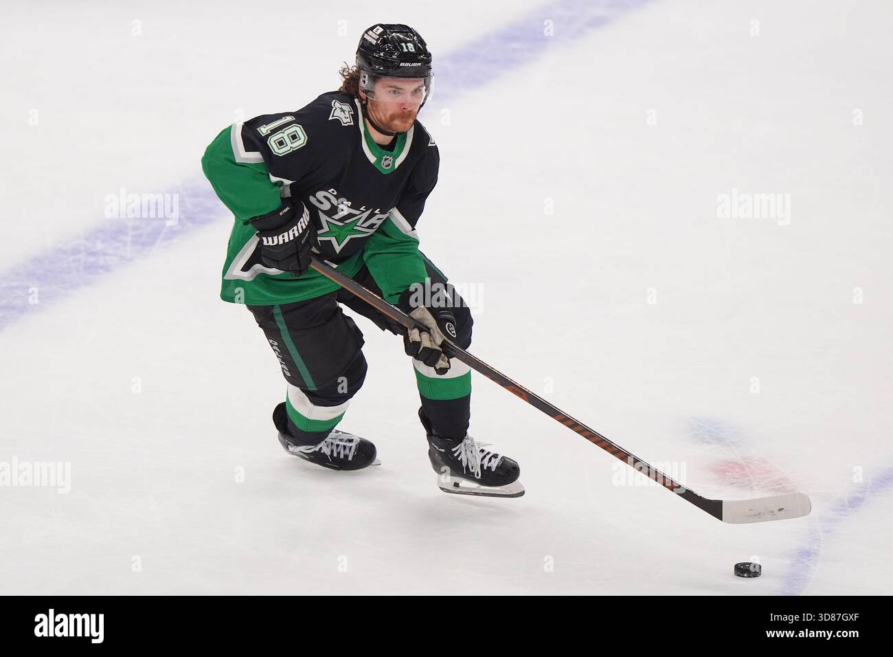 Dallas Stars center Sam Steel skates with the puck during the second ...