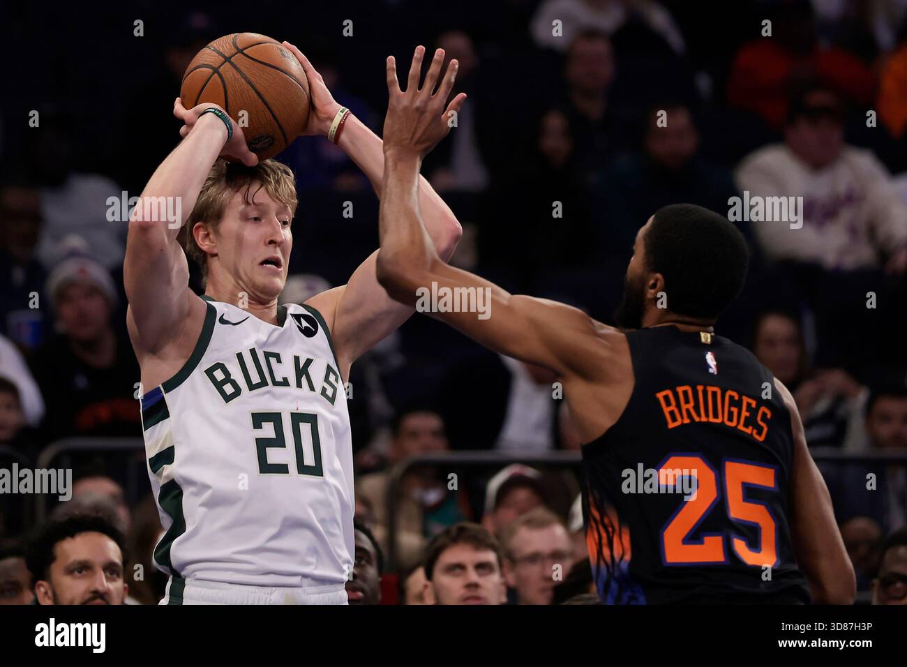 Milwaukee Bucks guard AJ Green (20) looks to pass over New York Knicks ...