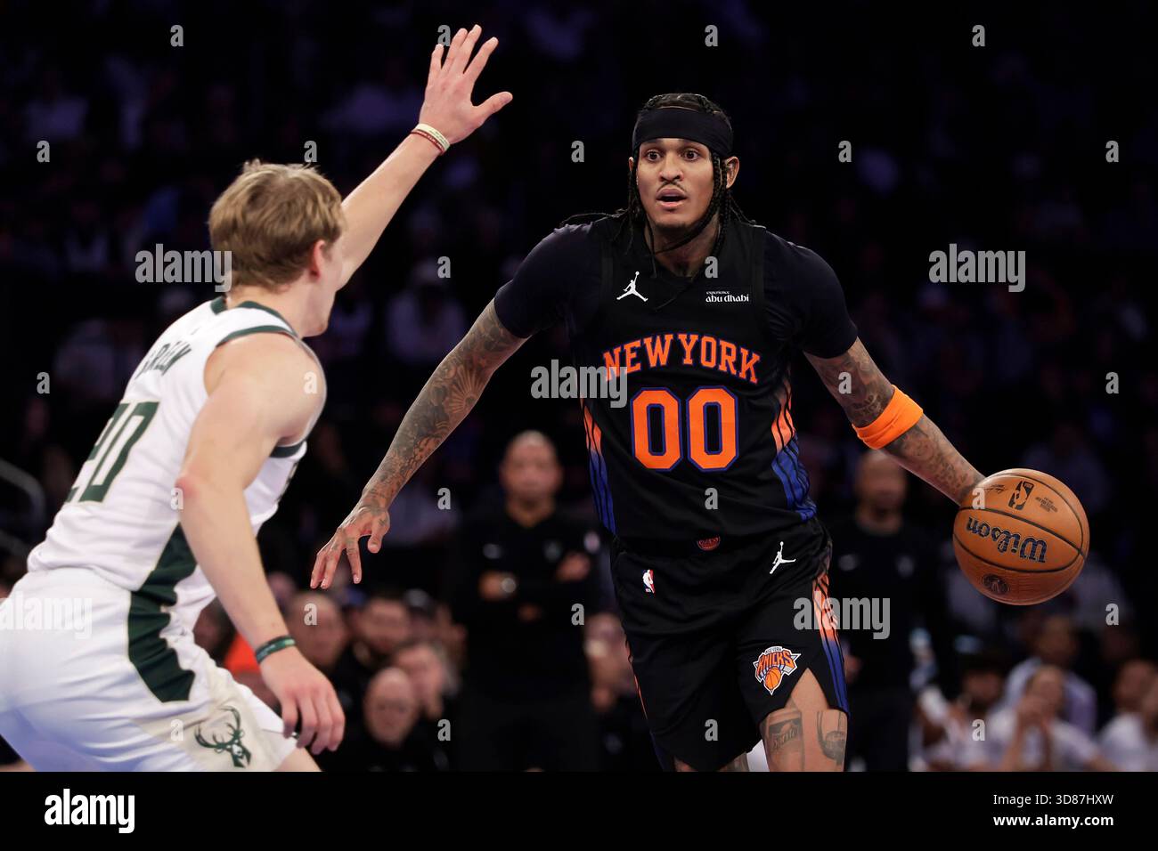 New York Knicks guard Jordan Clarkson (00) looks to pass around ...