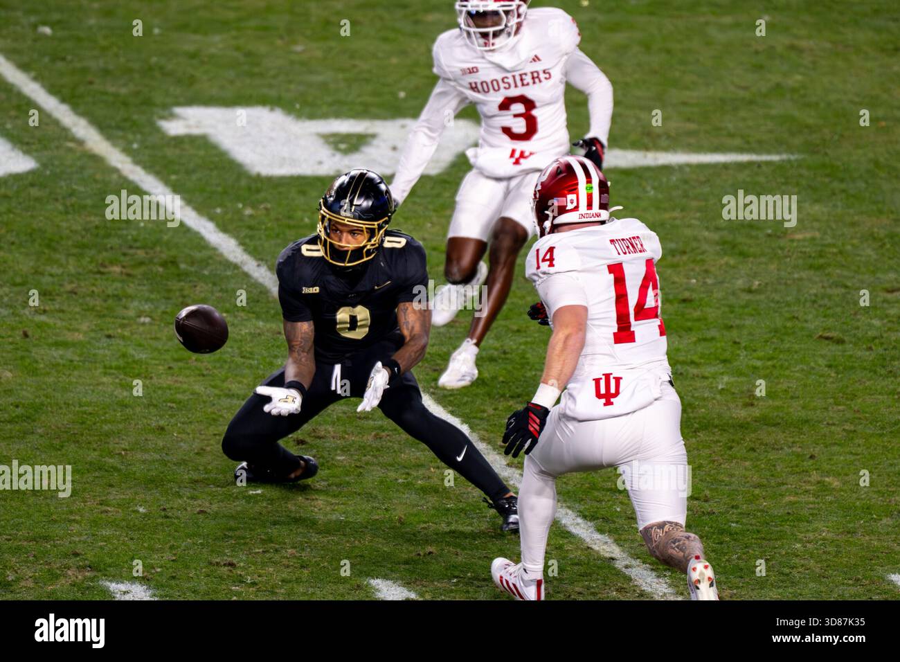 Purdue wide receiver Nitro Tuggle (0) watches for the ball during the ...