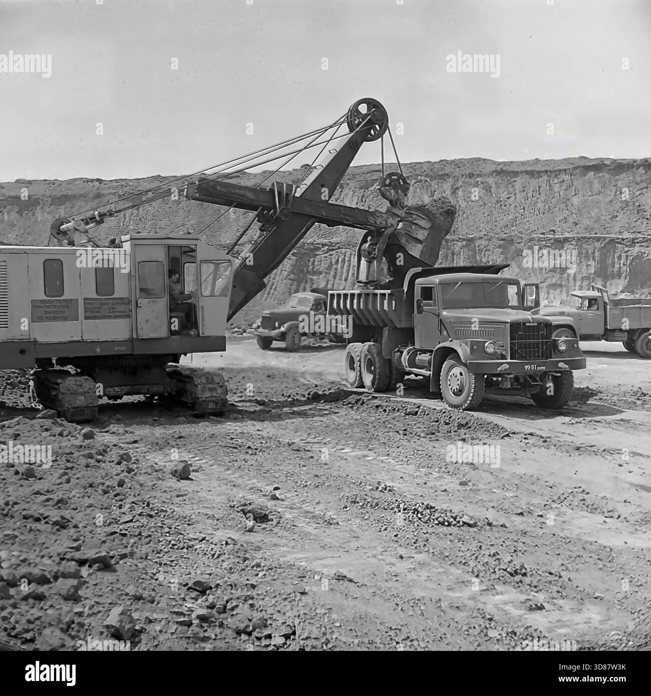 Excavator loads clay trucks hi-res stock photography and images - Alamy