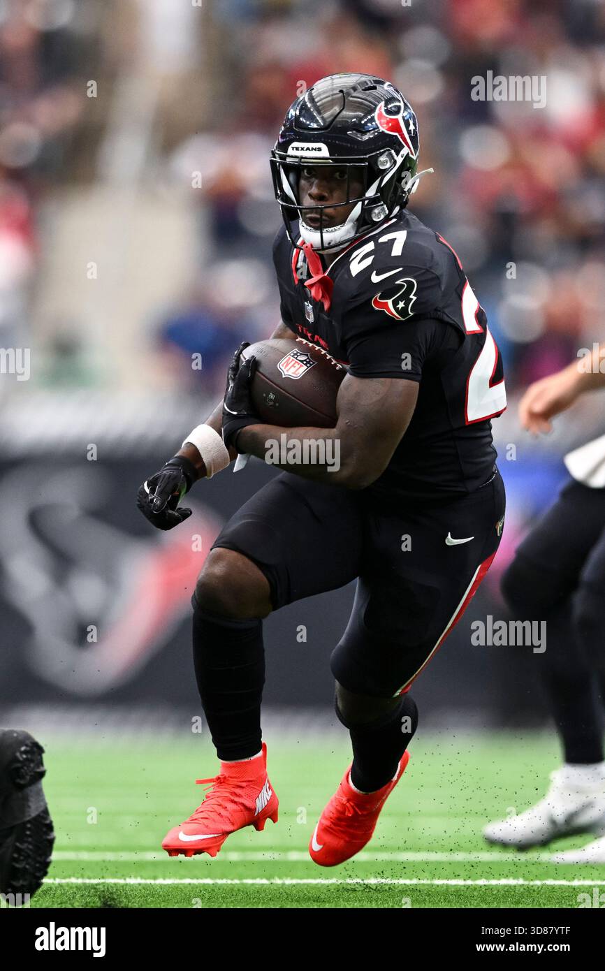 Houston Texans running back Woody Marks (27) runs the ball during the ...