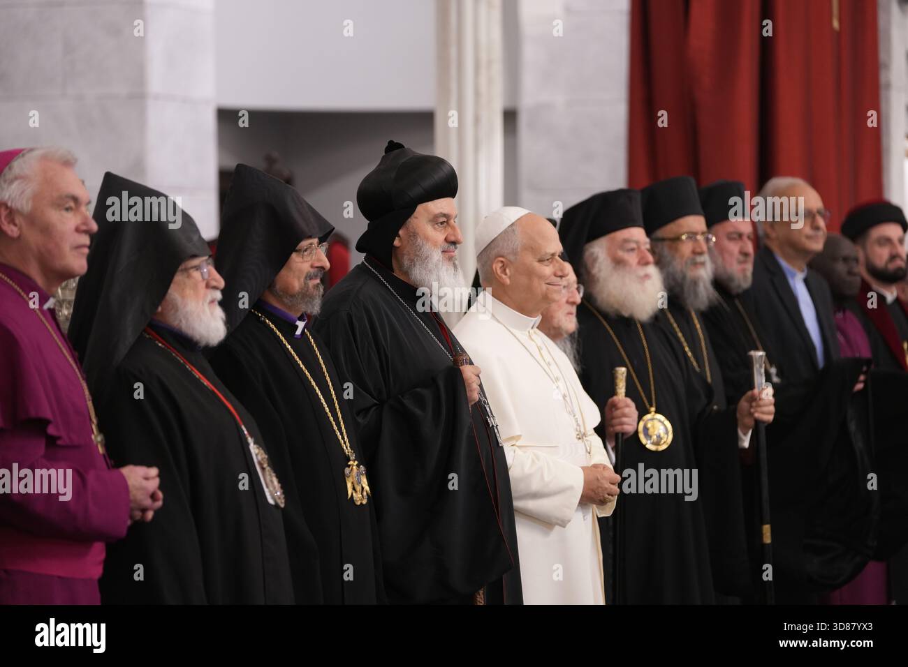 Pope Leo XIV, center, meets with the leaders of the local churches and ...