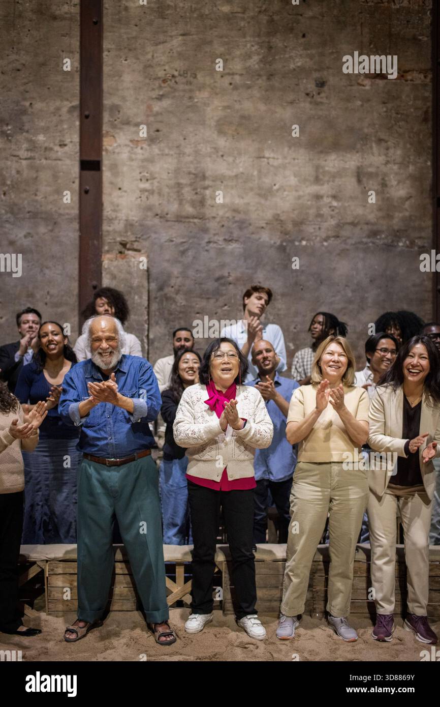 Standing ovation hispanic hi-res stock photography and images - Alamy
