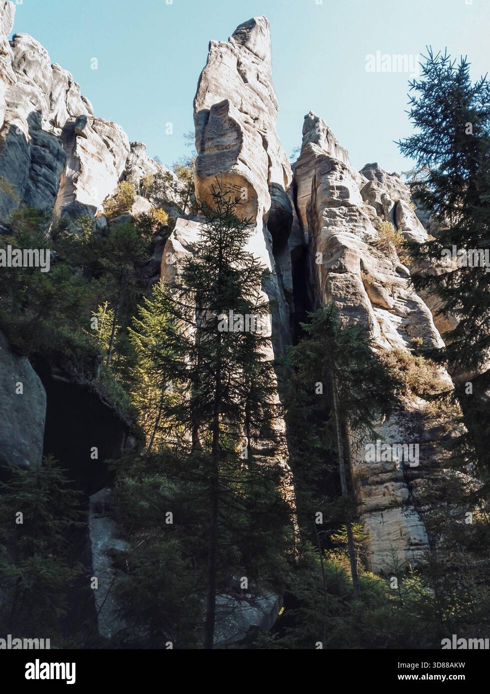 Majestic vertical sandstone rock formations rising high above the ...