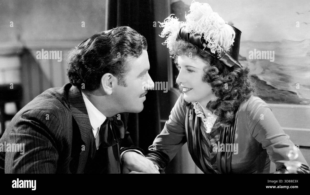 PRESTON FOSTER and BARBARA STANWYCK in ANNIE OAKLEY (1935), directed by ...