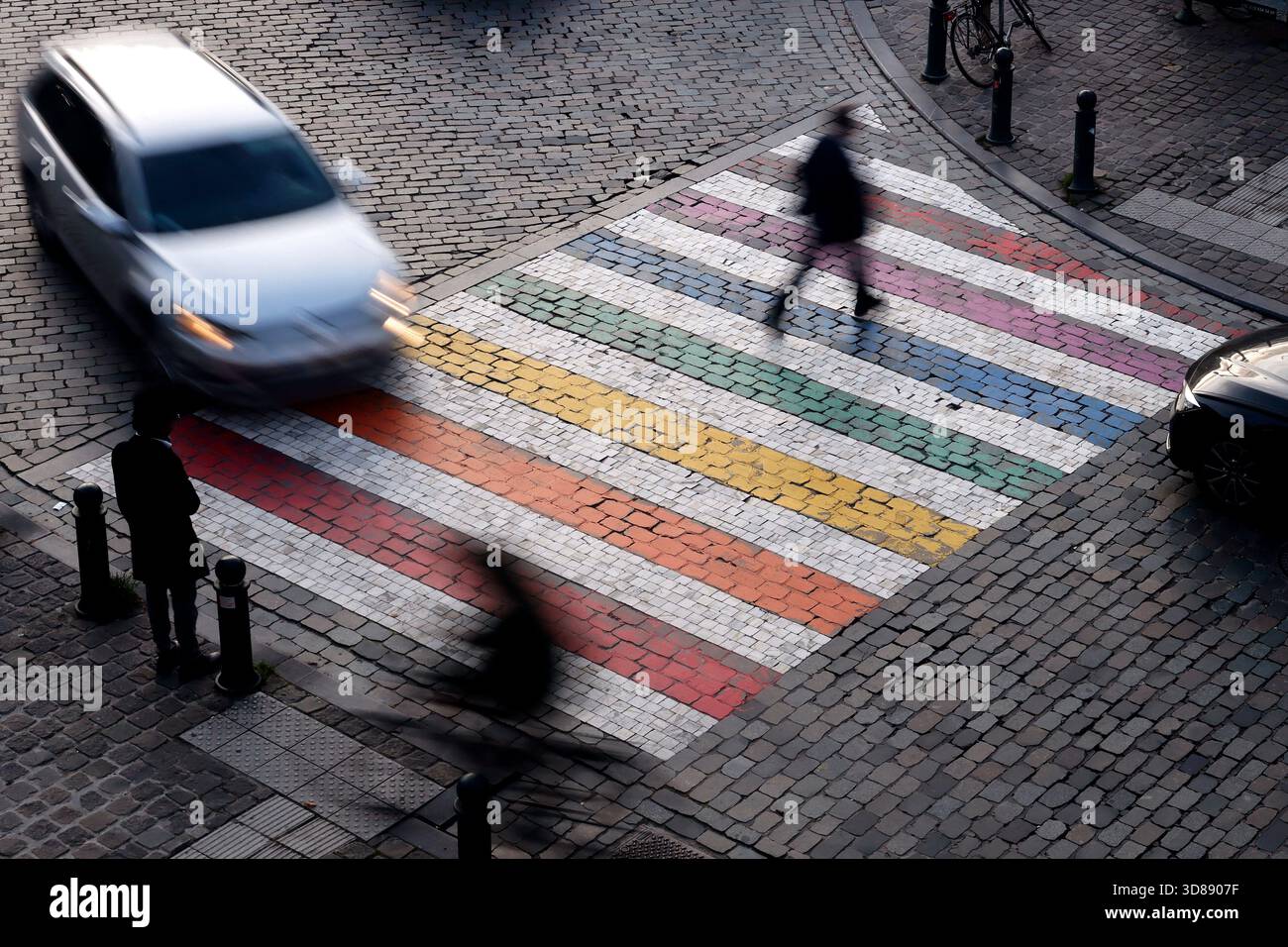 A rainbow pedestrian crossing visible in front of the EU Parliament in ...