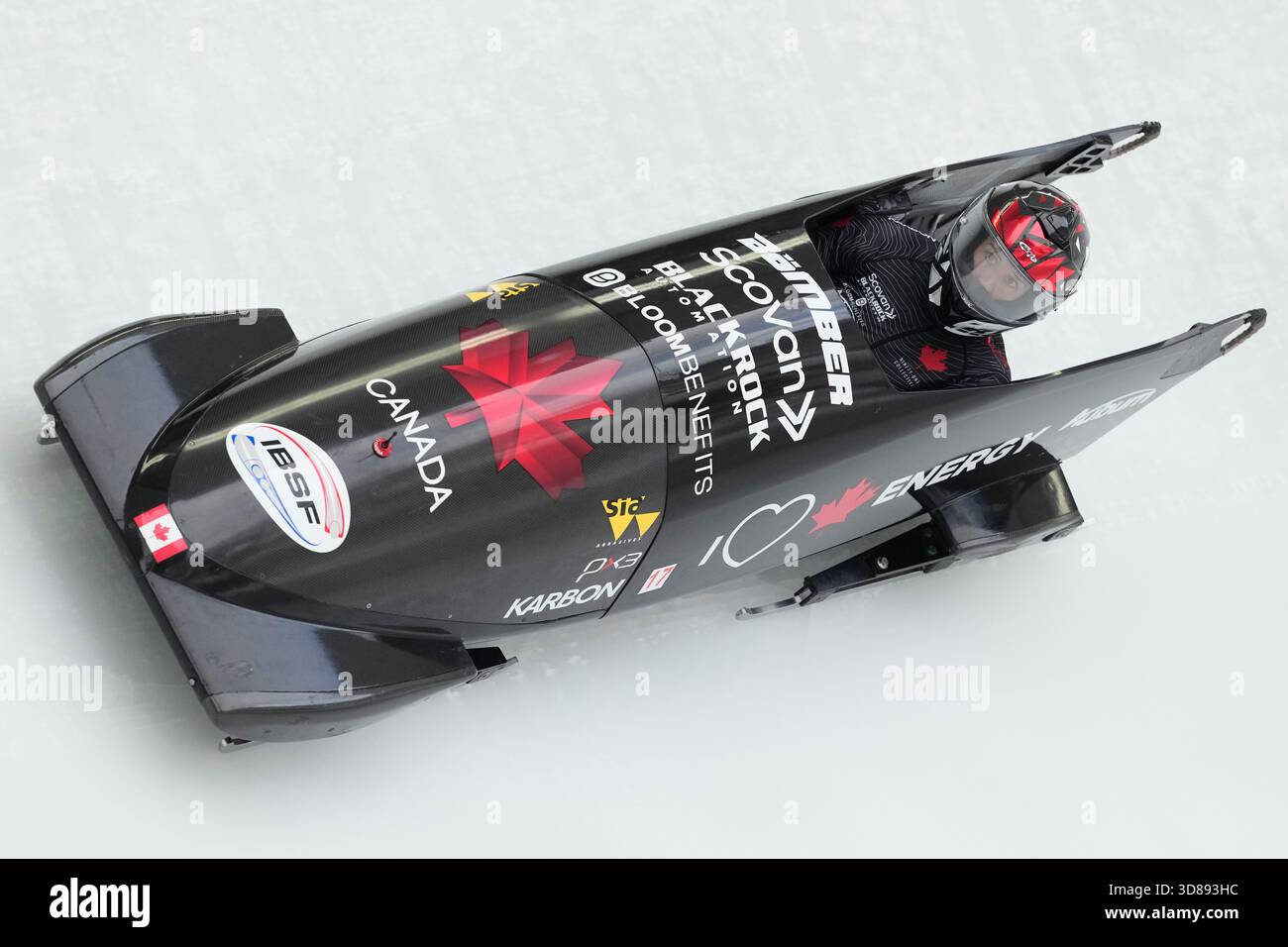 Kristen Bujnowski of Canada speeds down the track during the women's ...