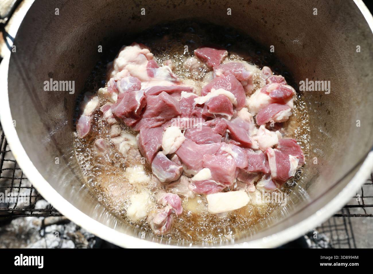 Red meat chunks boiling hi-res stock photography and images - Alamy