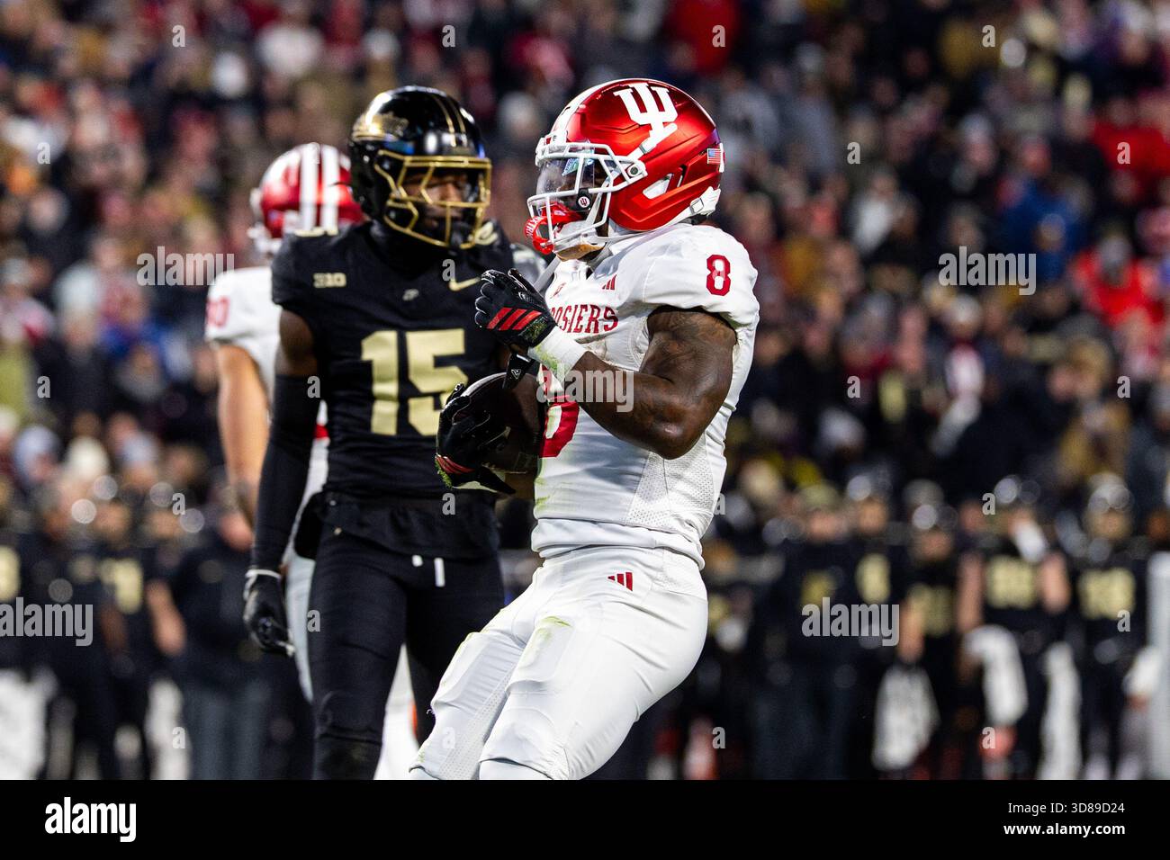 November 28, 2025: Indiana running back Kaelon Black (8) runs with the ...