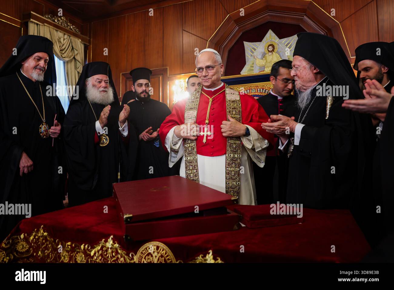 Pope Leo XIV receives a stole, a liturgical vestment, during a ceremony ...