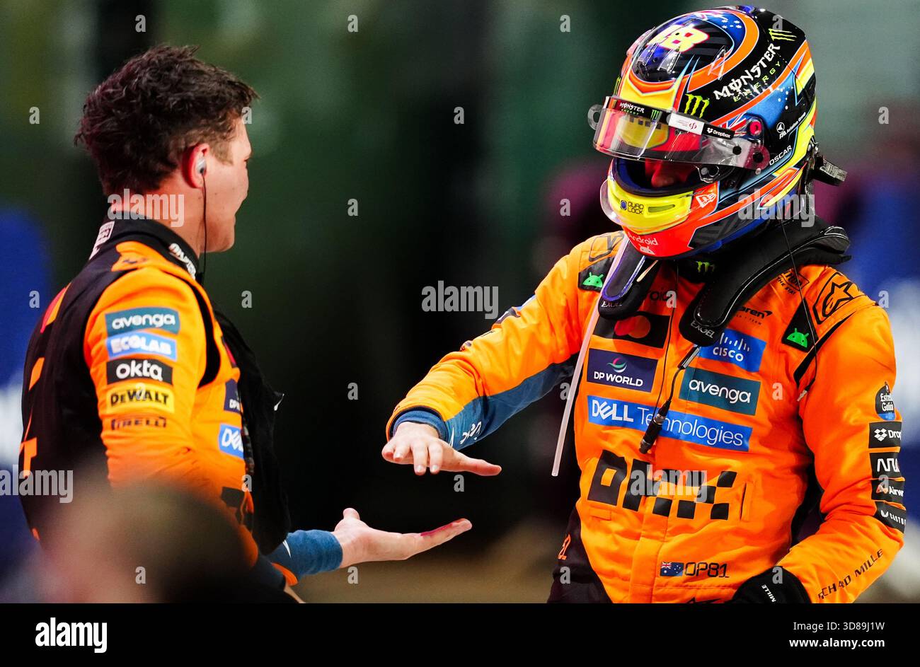 McLaren drivers Lando Norris (left) and Oscar Piastri following the ...