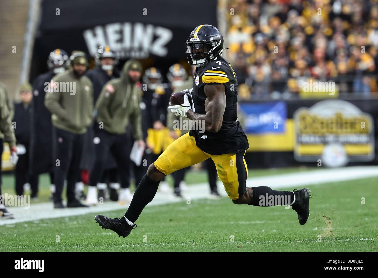 Pittsburgh Steelers' DK Metcalf runs with the ball after a catch ...