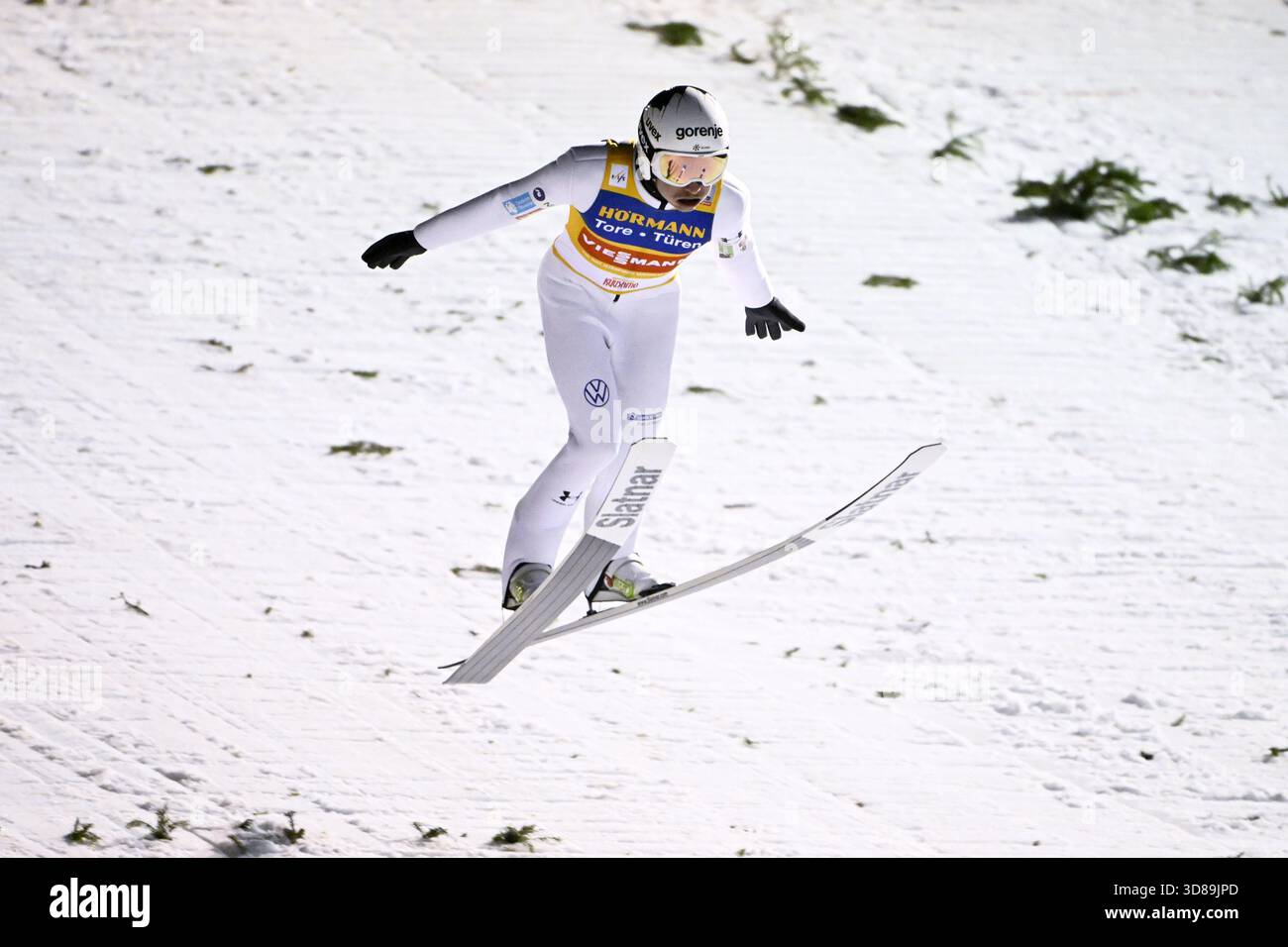 Anze Lanisek of Slovenia competes during men's ski jumping large hill ...