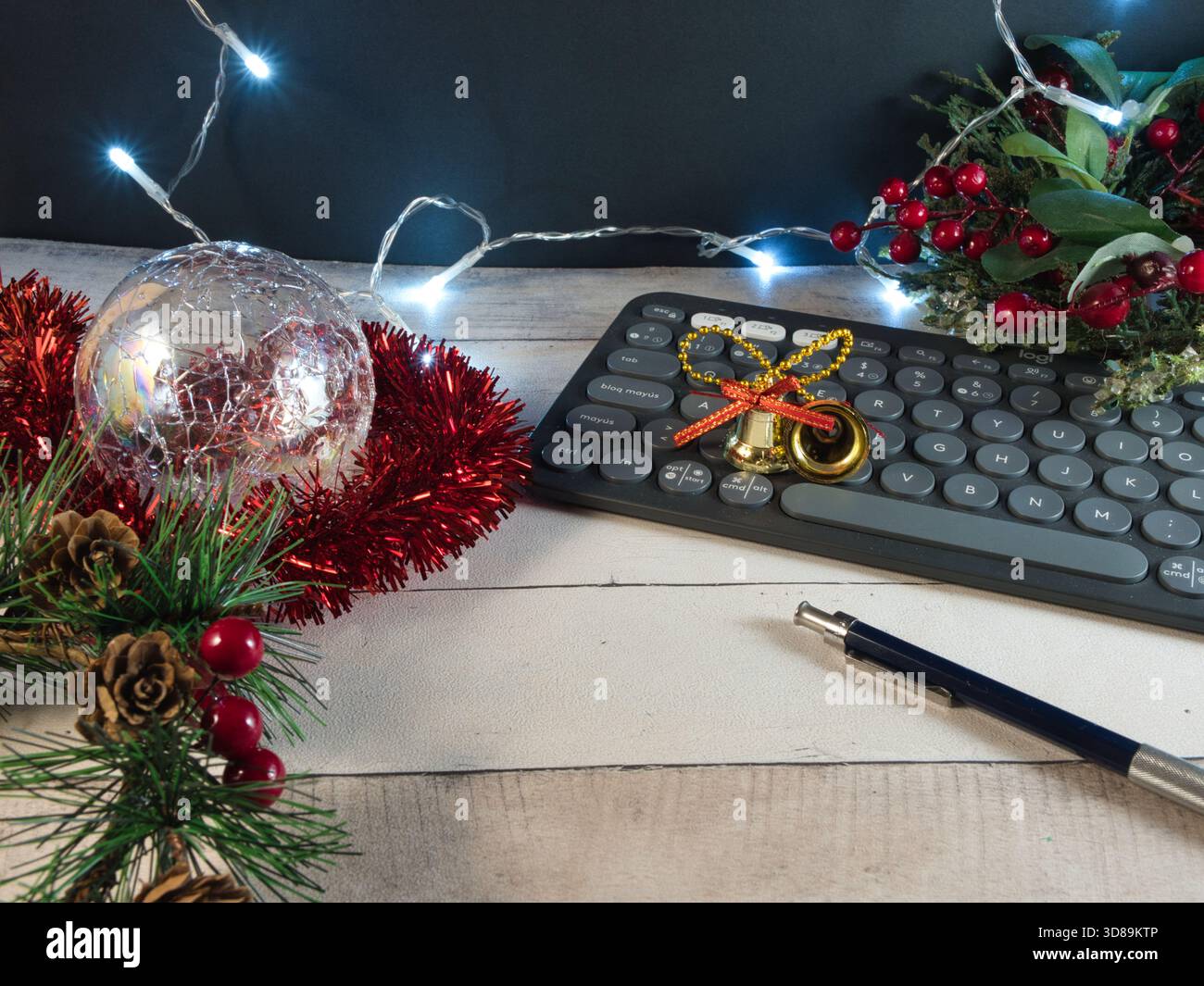 Festive Holiday Workspace with Keyboard - A cozy, decorated workspace ...