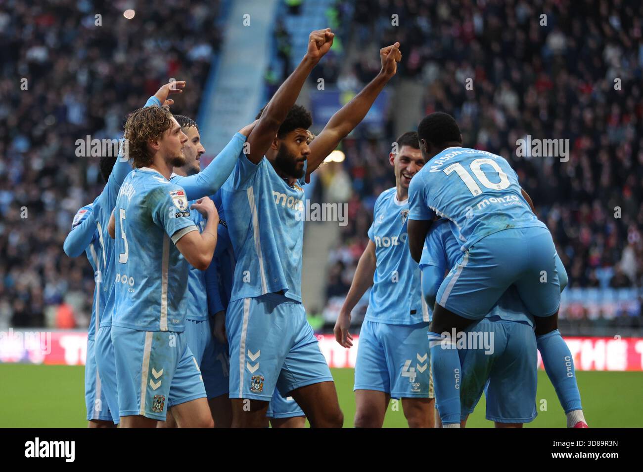Coventry City's Ellis Simms (centre) celebrates scoring their side's ...
