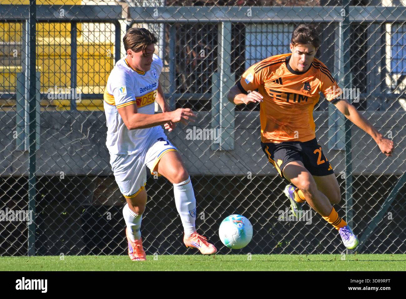 Emanuele Lulli (AS Roma) battles for possession with Luca Dalla Costa ...