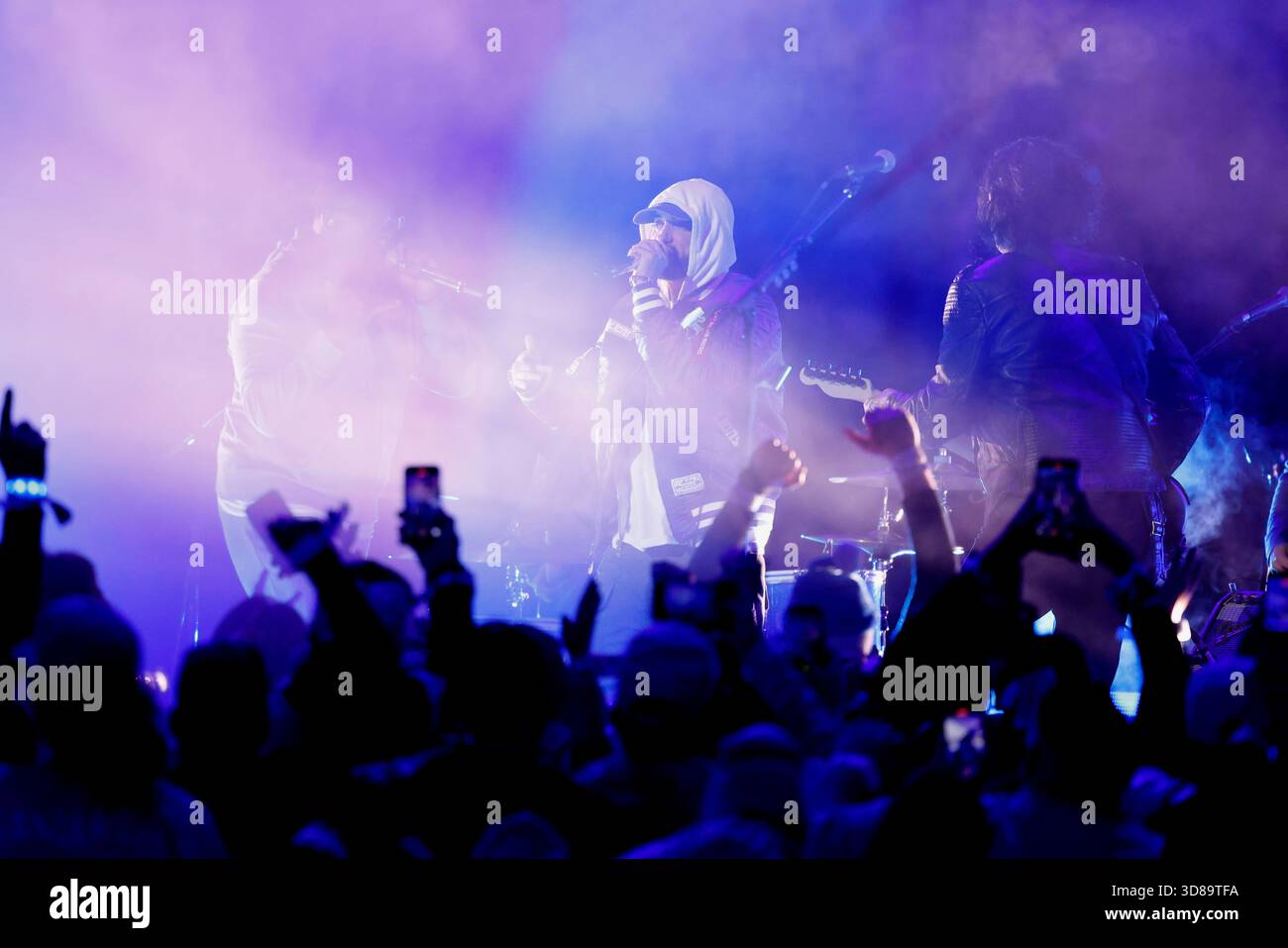 Eminem performs at halftime during an NFL football game between the ...