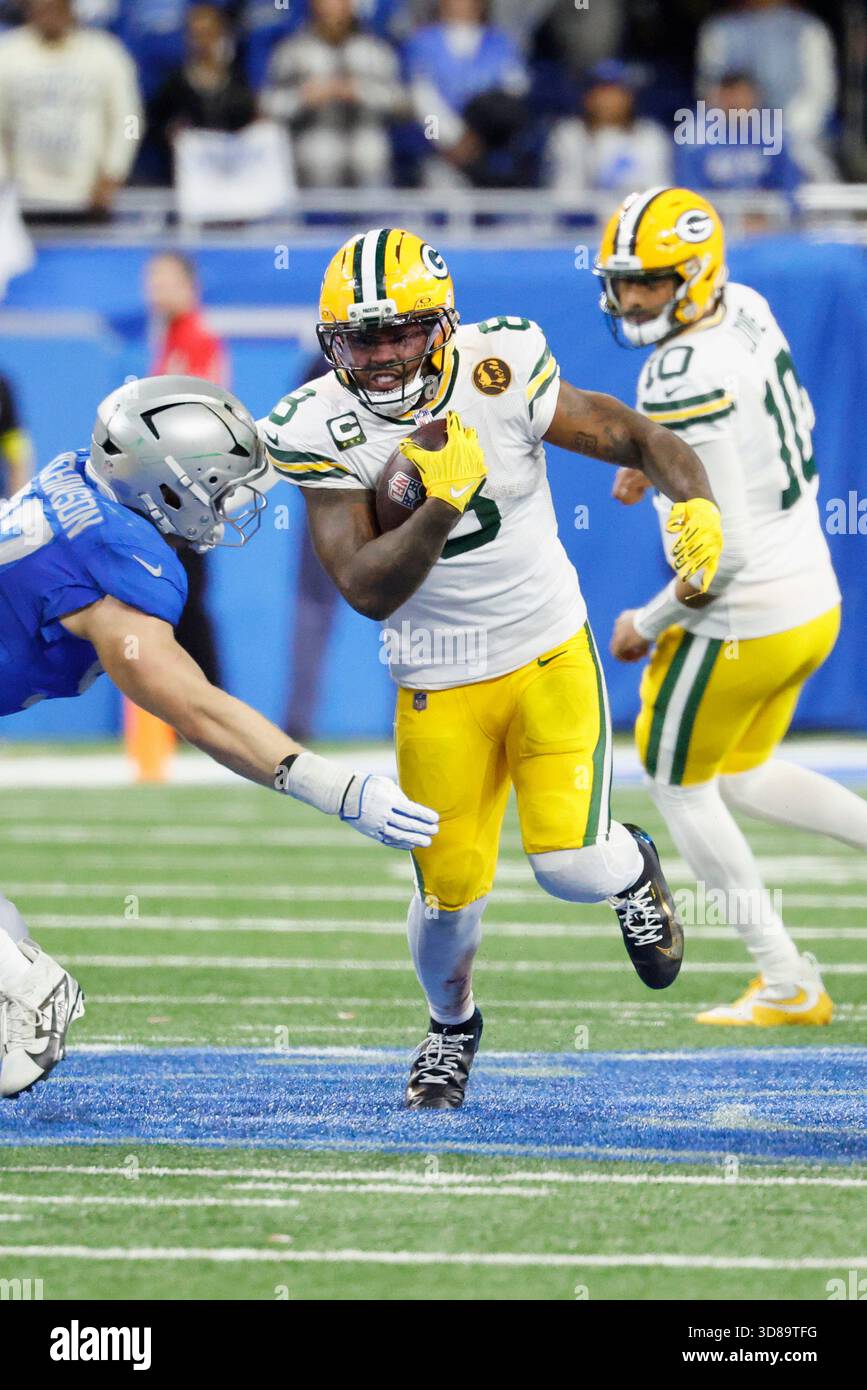 Green Bay Packers running back Josh Jacobs (8) is tackled by Detroit ...
