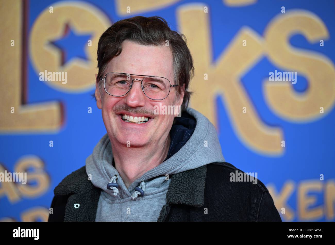 29 November 2025, Bavaria, Munich: Comedian Florian Simbeck stands on ...