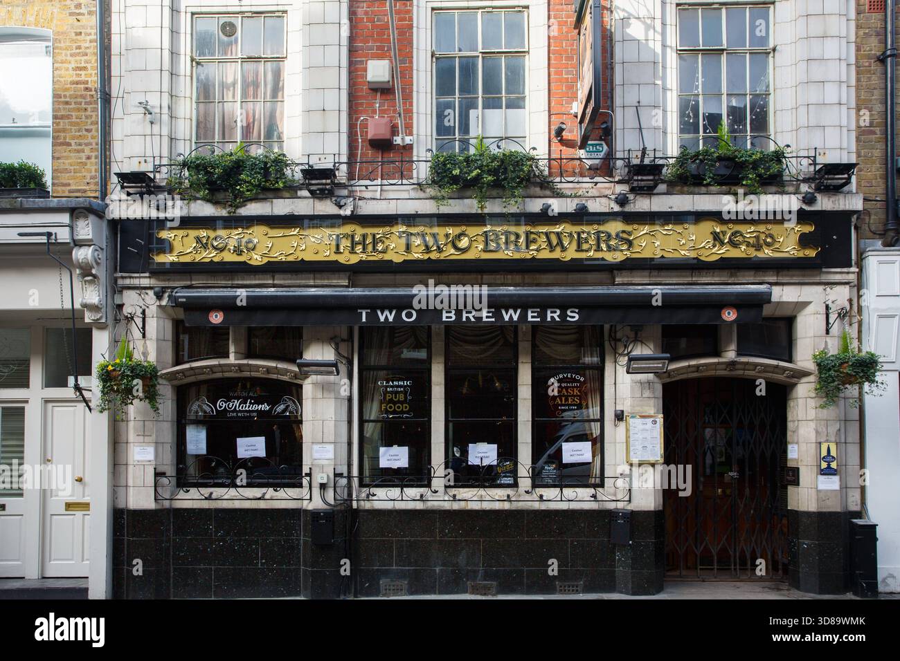 The famous Two Brewers pub historic brick building facade in Covent ...