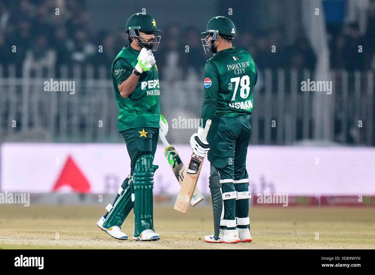 Pakistan's Babar Azam, left, Usman Khan celebrate after winning the ...