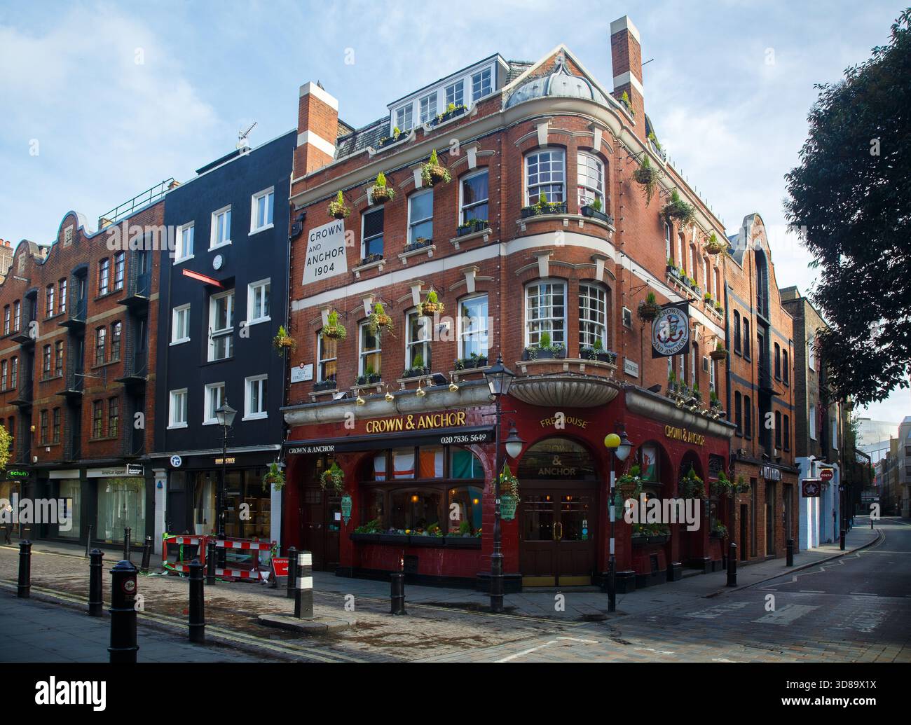 The famous Crown and Anchor pub historic brick building facade on a ...